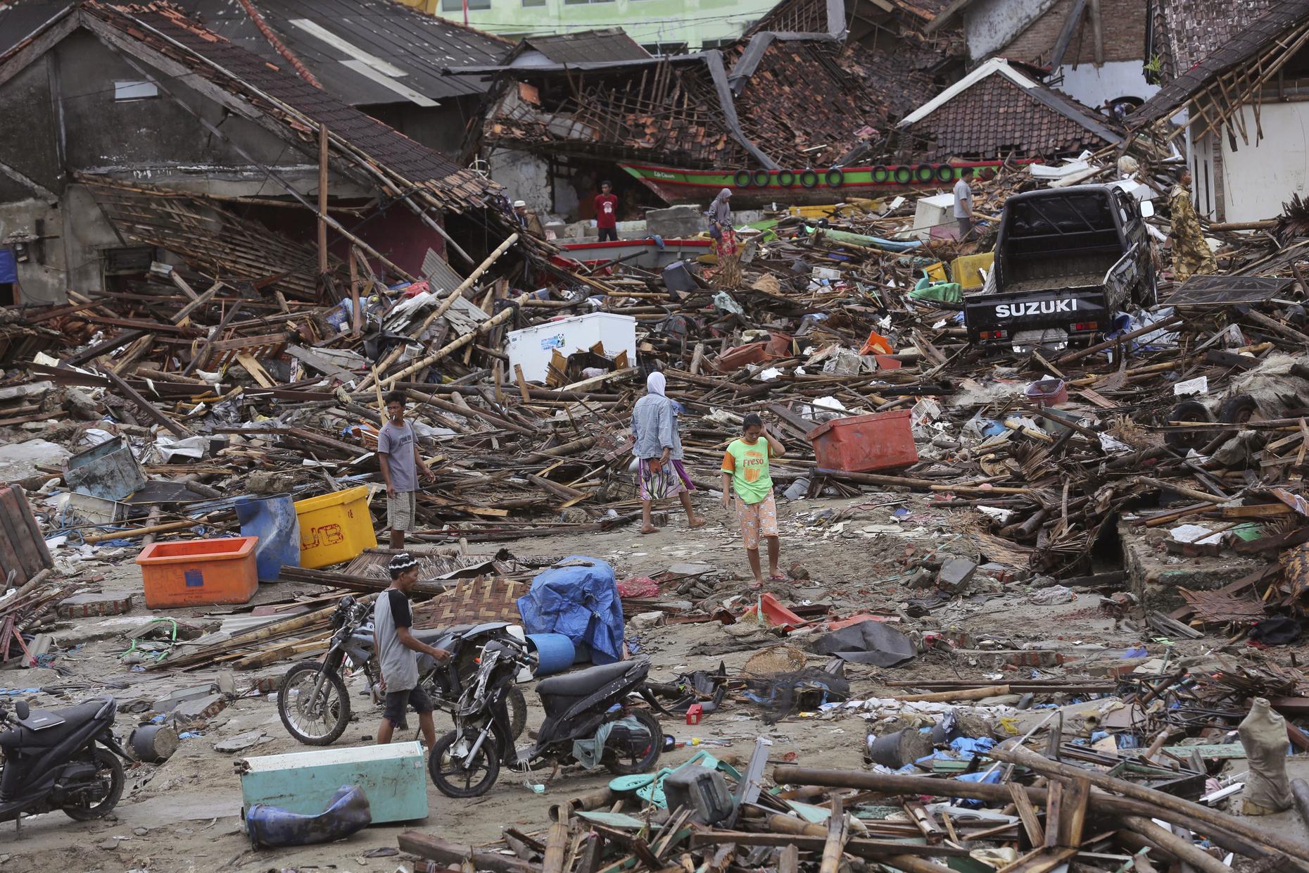 Indonesia Promises New Tsunami Warning System As Rescue Efforts ...